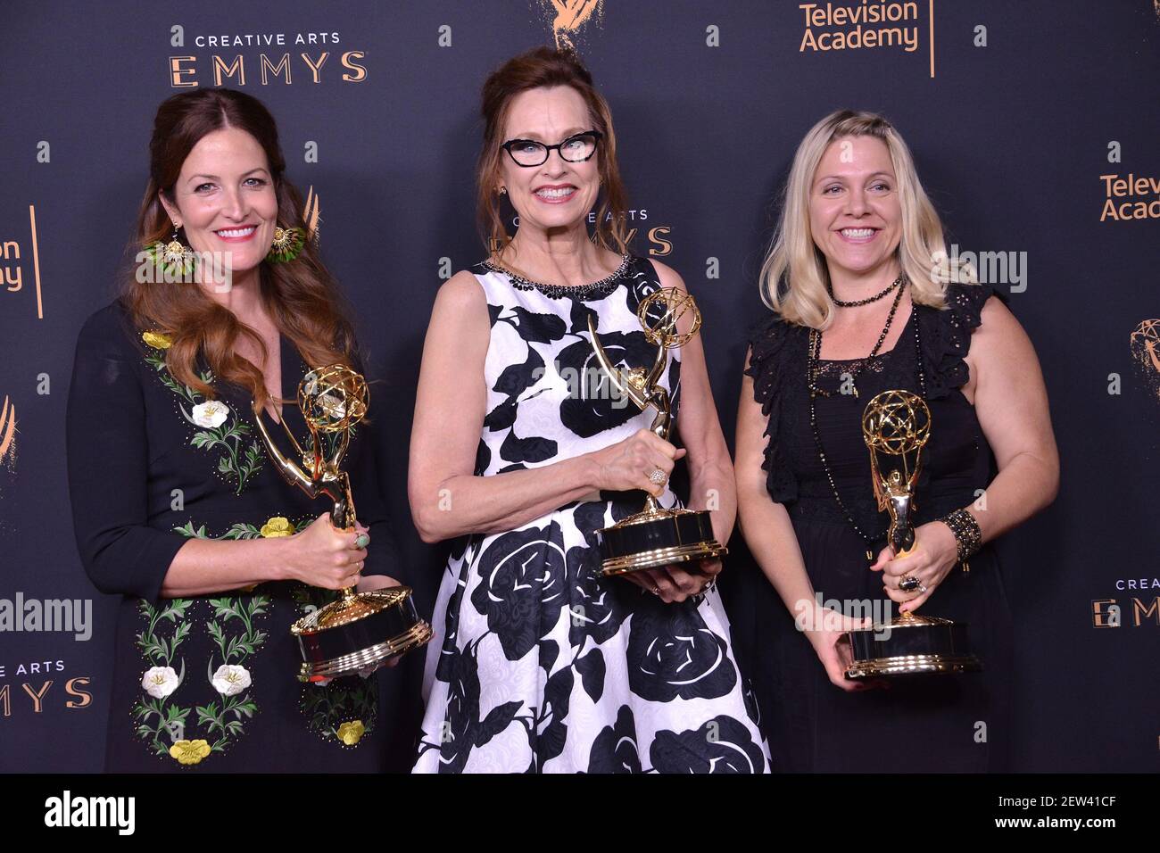 Alex Friedberg, from left, Patricia McLaughlin and Risa Garcia pose in ...
