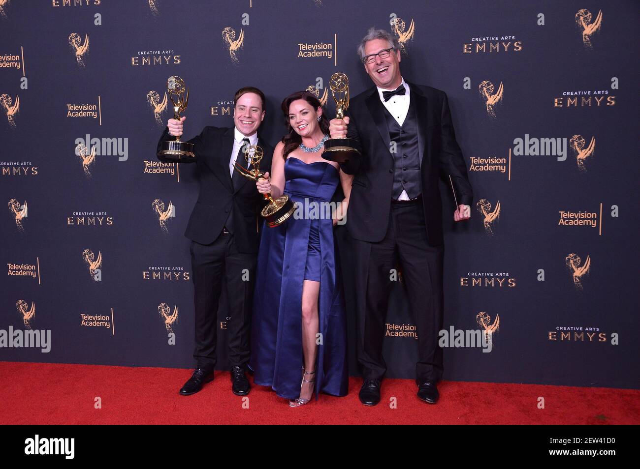 (L-R) Andrew Leitch, Kimberly Wannop, and Jim Gloster pose in the press ...