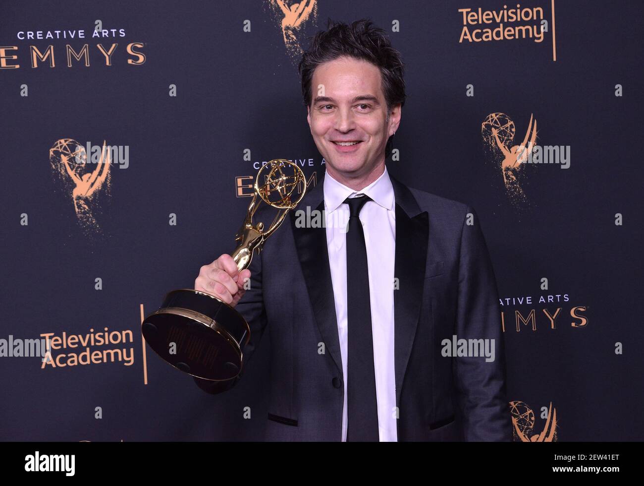 Jeff Russo poses in the press room with the award for outstanding music ...