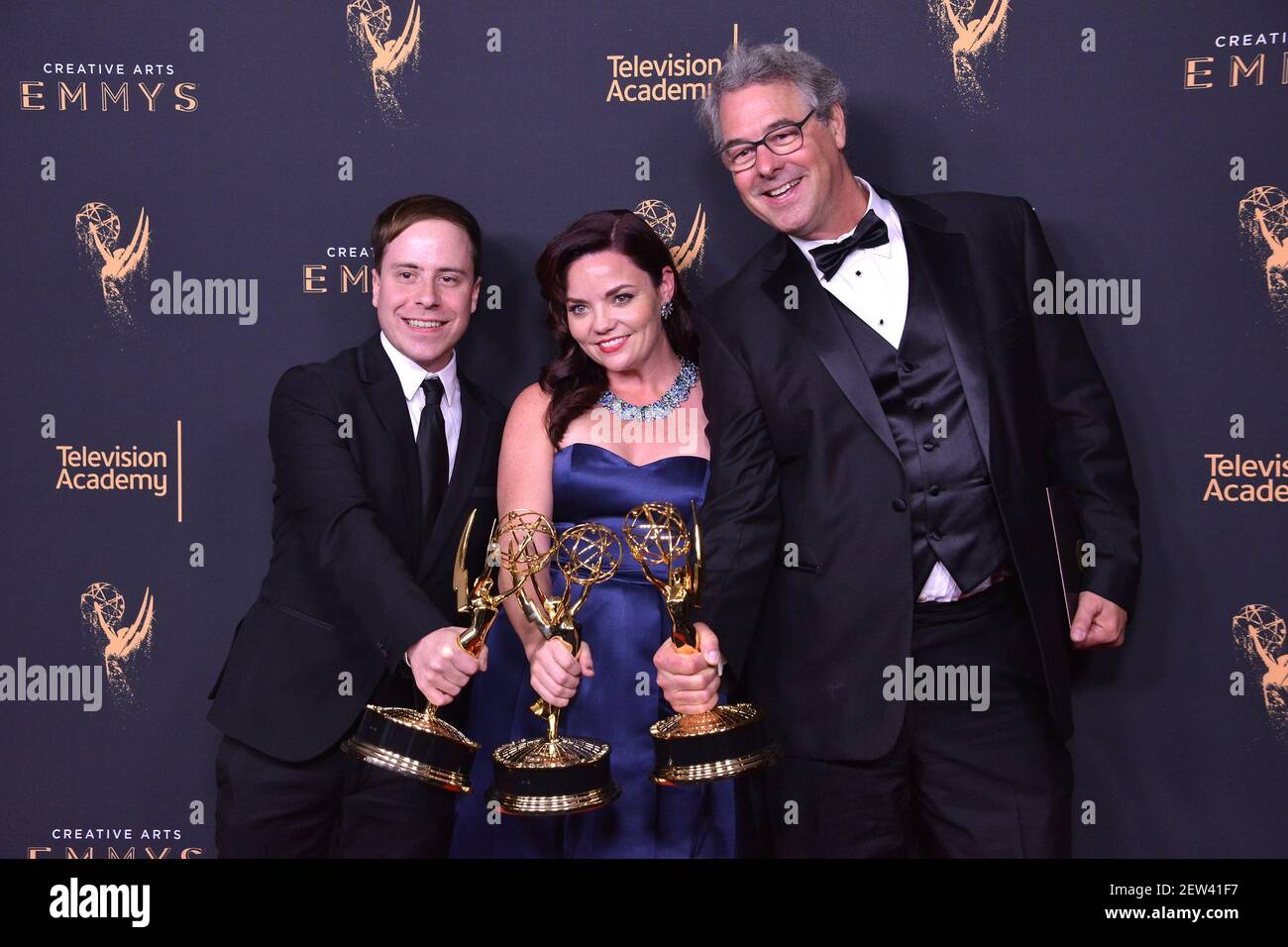 (L-R) Andrew Leitch, Kimberly Wannop, and Jim Gloster pose in the press ...