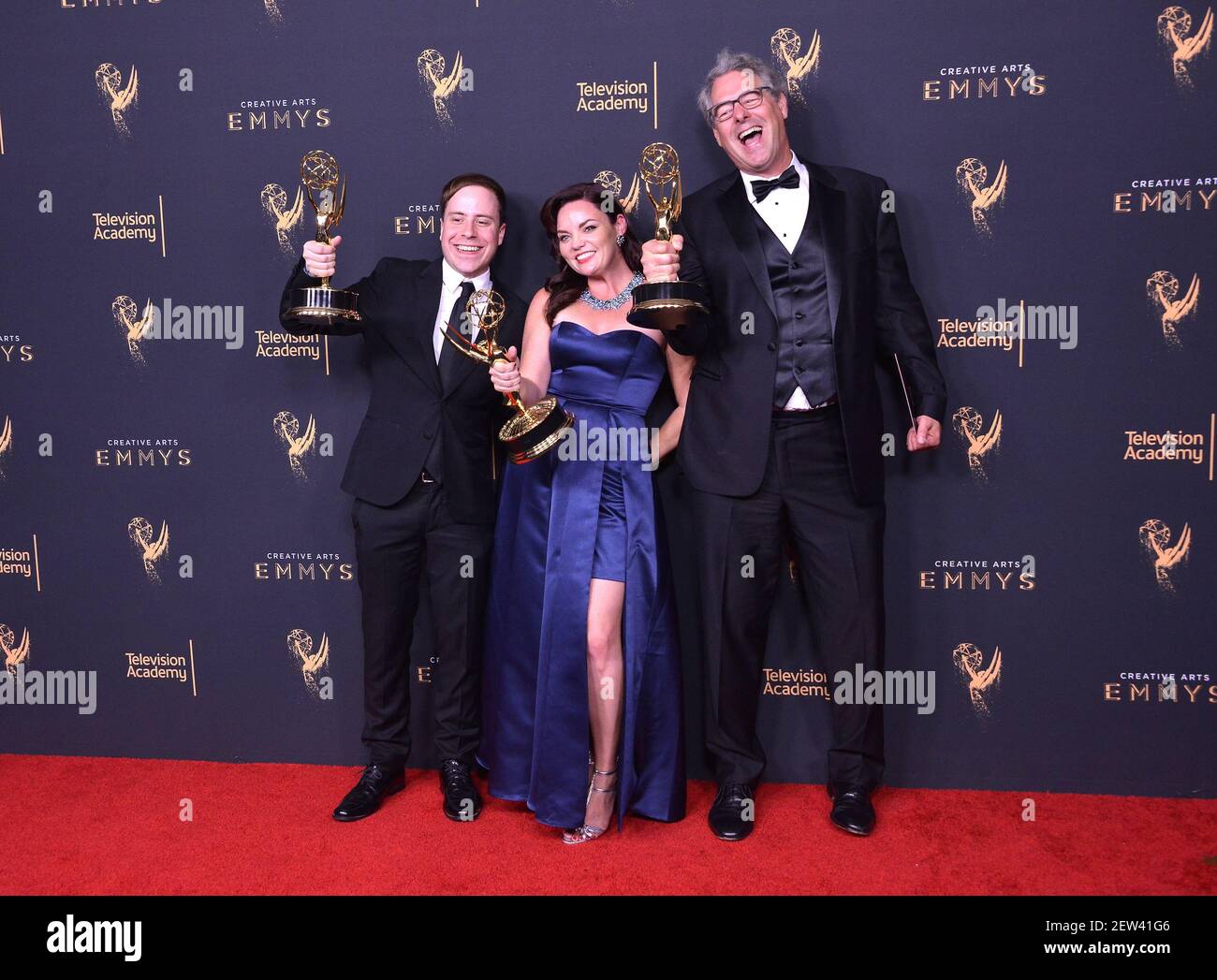 (L-R) Andrew Leitch, Kimberly Wannop, and Jim Gloster pose in the press ...