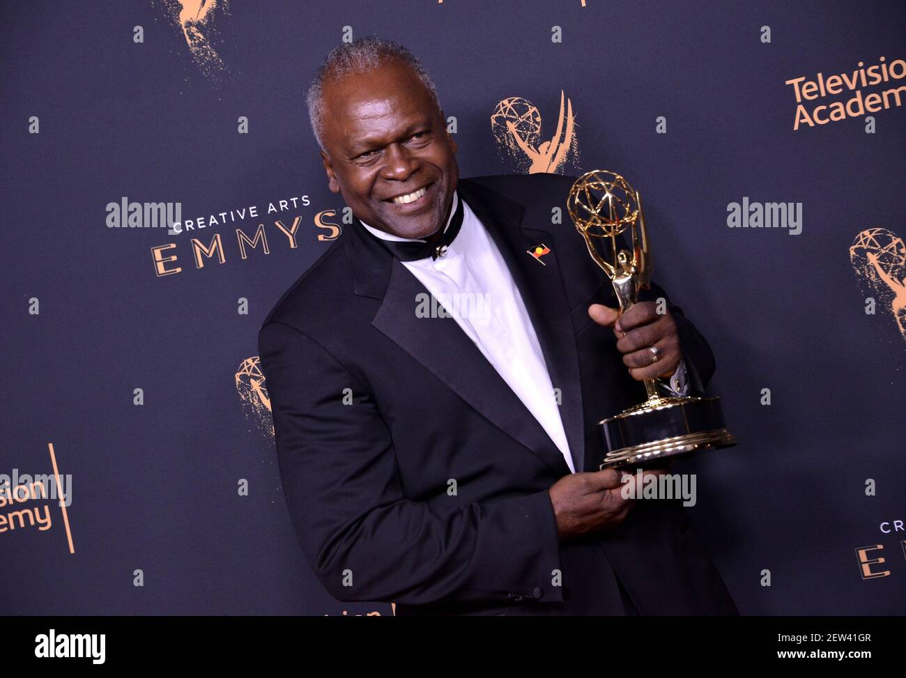Actor Kim Estes poses in the press room with accepts the award for ...