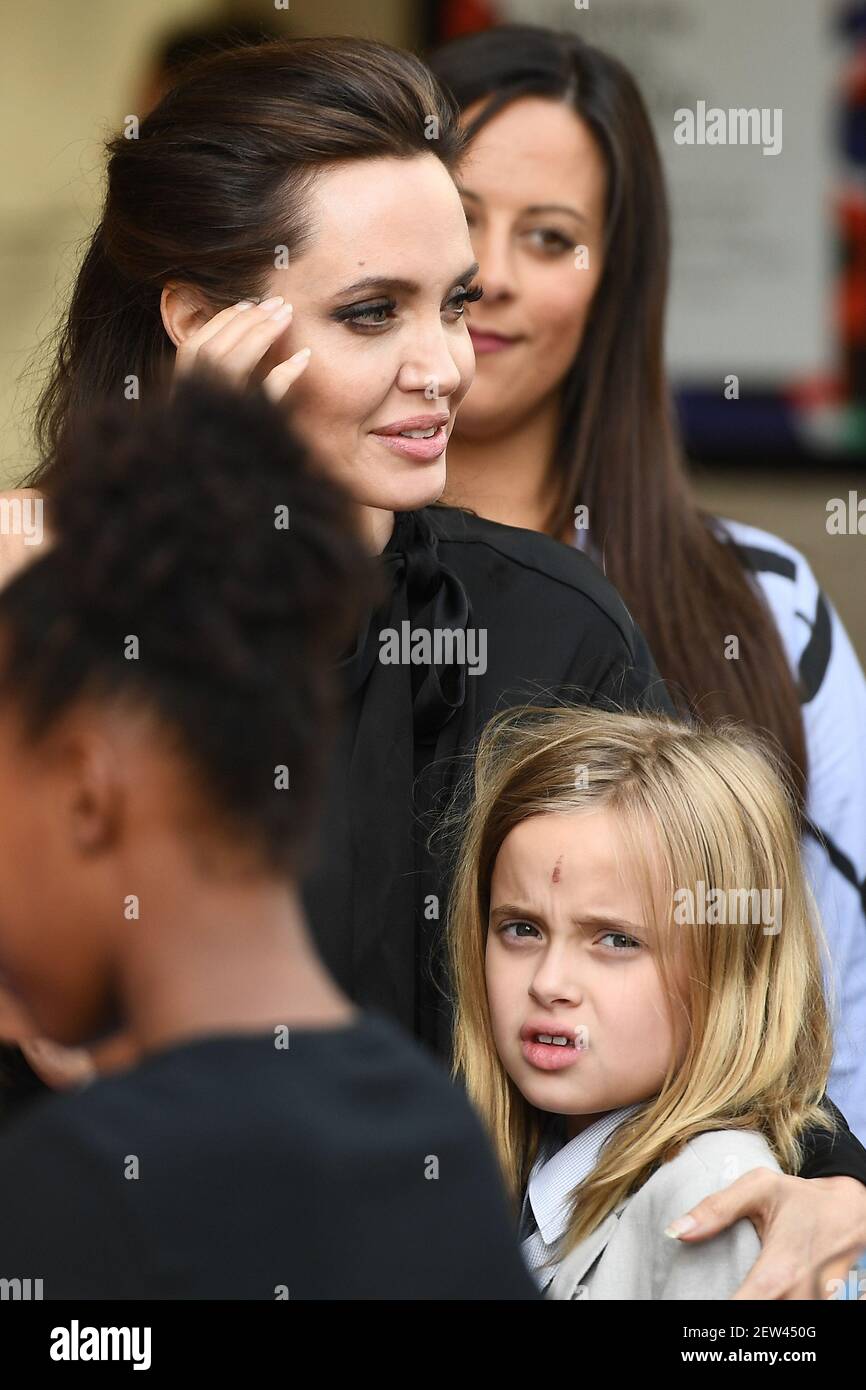 L R Angelina Jolie Zahara Jolie Pitt Back To Camera And Vivienne