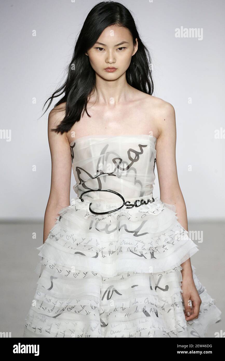 Model He Cong walks on the runway during the Oscar de la Renta Fashion ...