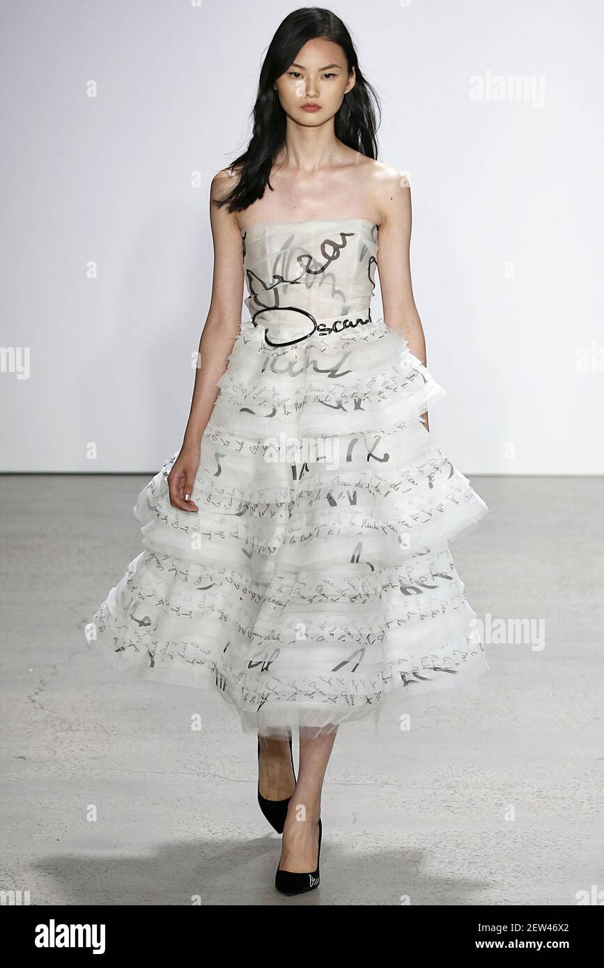 Model He Cong walks on the runway during the Oscar de la Renta Fashion ...