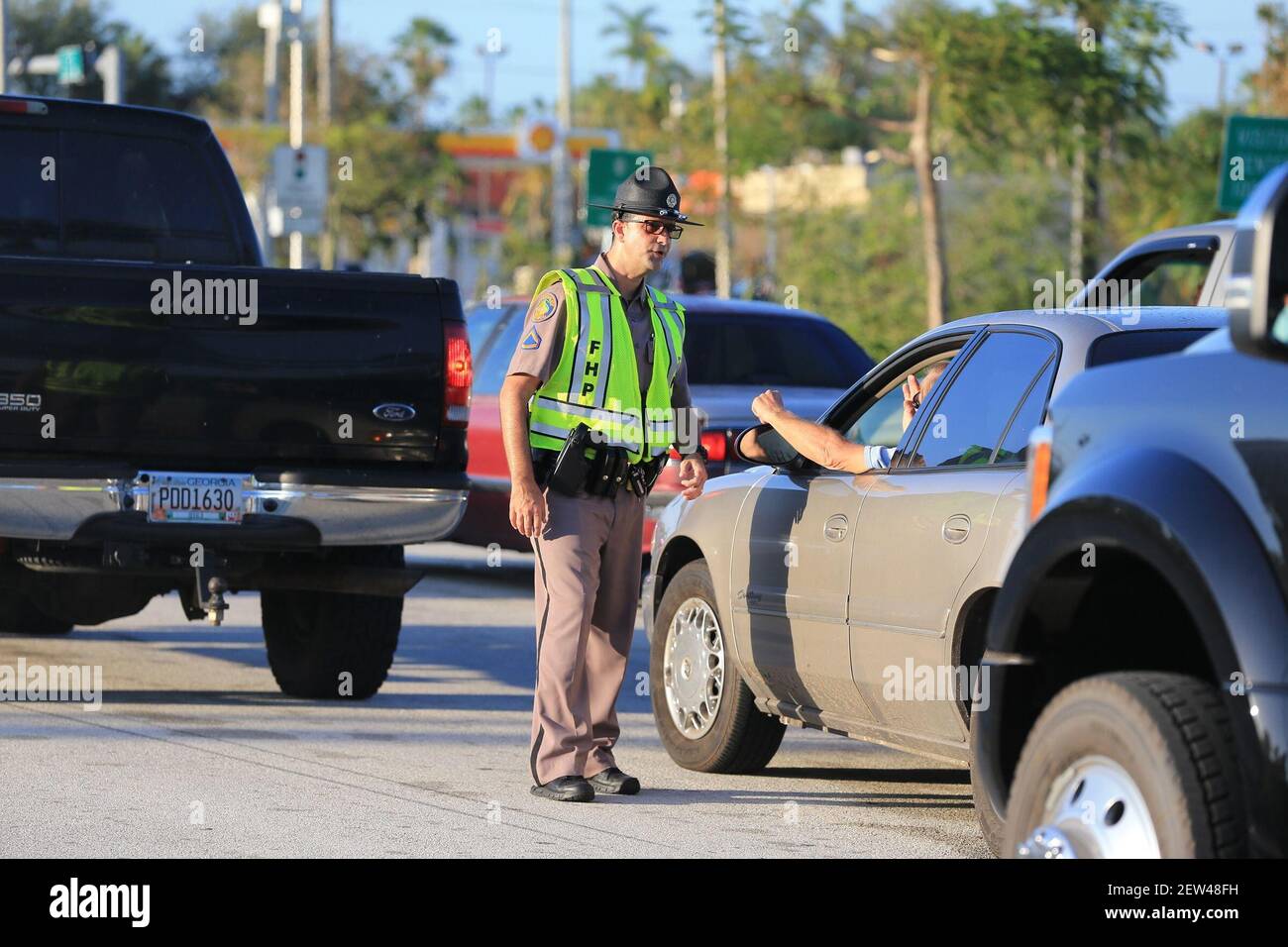 Police control access at a check point in Florida City, Fla., into the ...