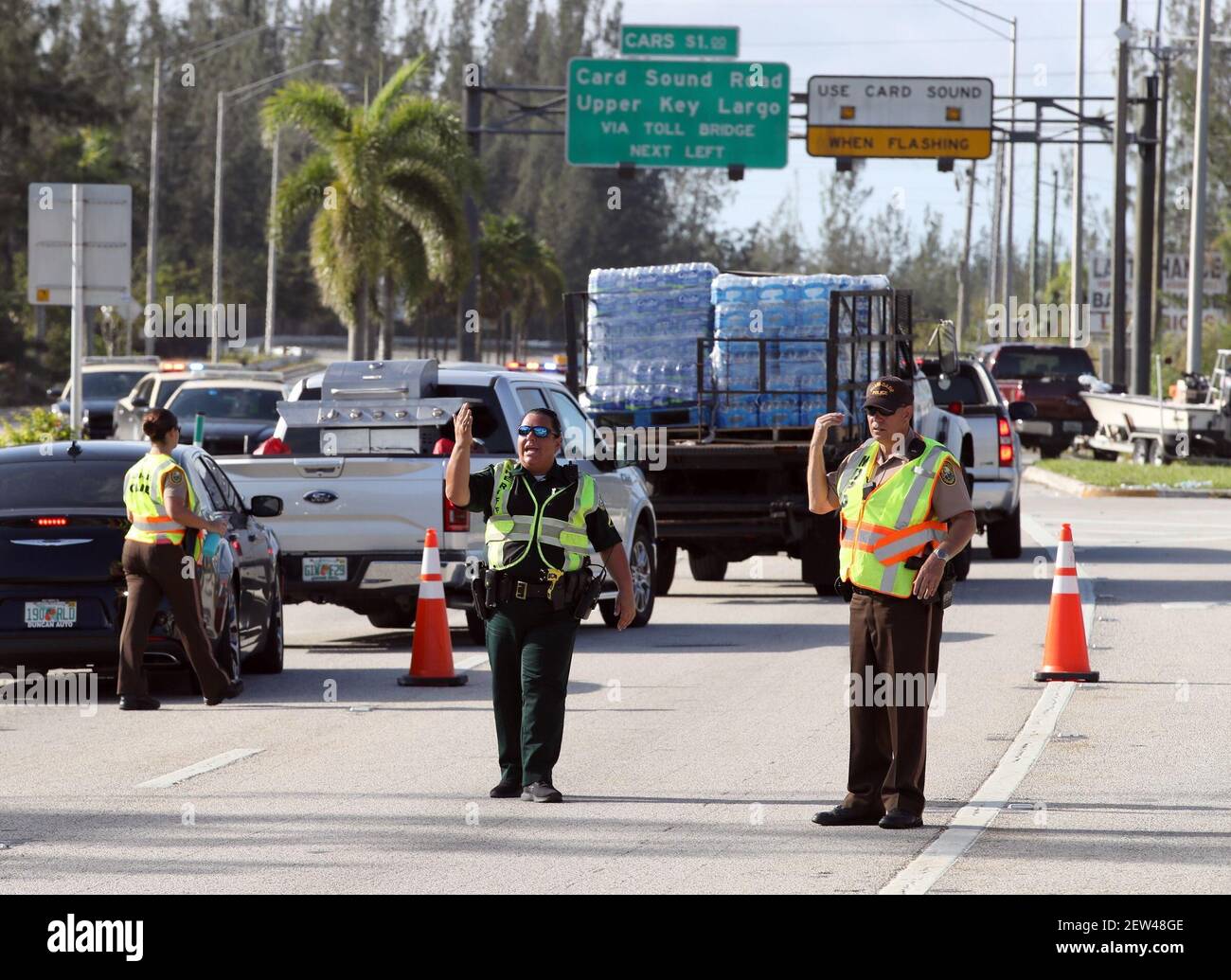 Police control access at a check point in Florida City, Fla., into the ...