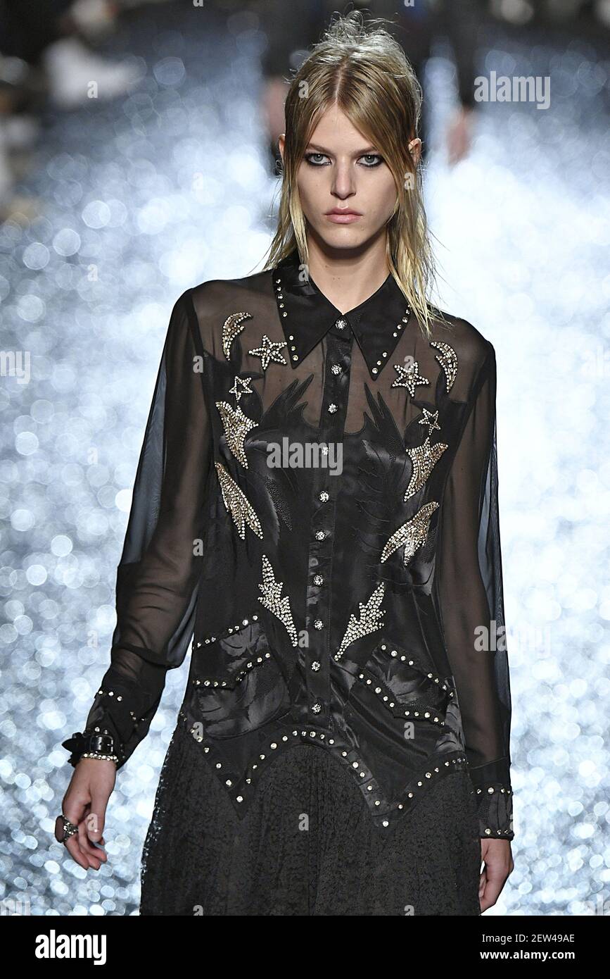 Model Line Kjaergaard walks on the runway during the Coach Fashion show ...