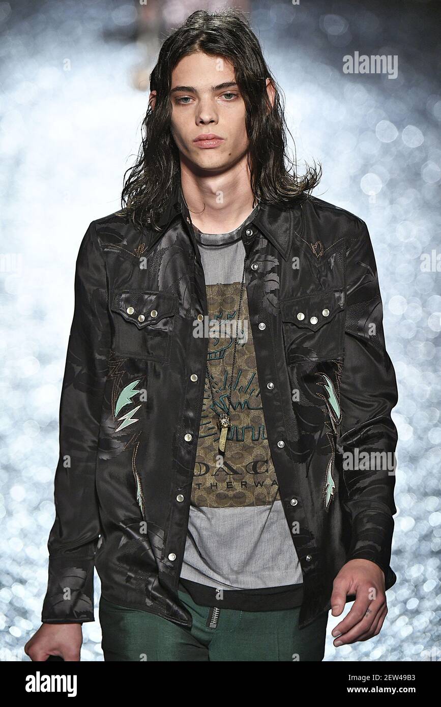 Model Erin Mommsen walks on the runway during the Coach Fashion show at ...