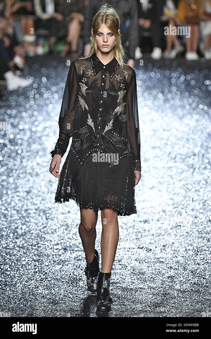 Model Line Kjaergaard walks on the runway during the Coach Fashion show ...