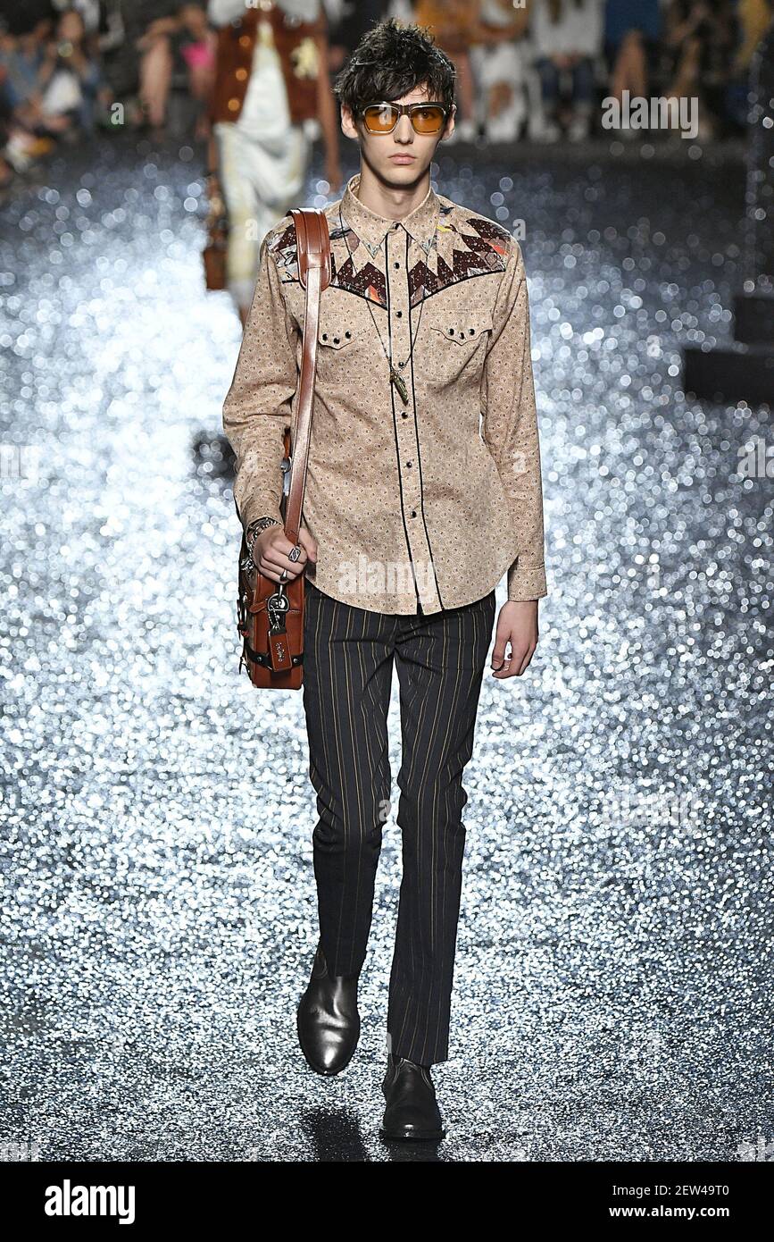 Model Eli Epperson walks on the runway during the Coach Fashion show at ...