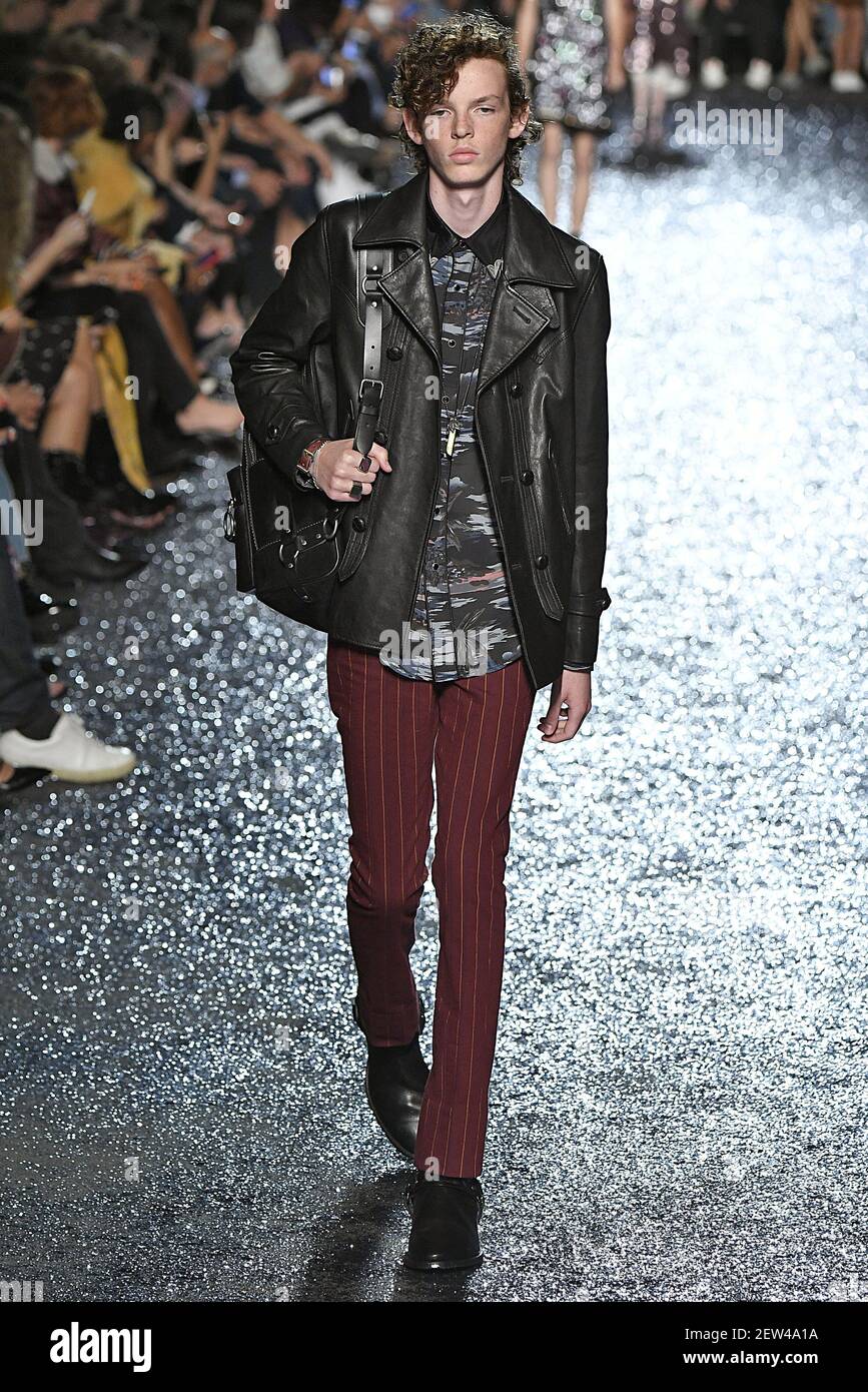 Model Isaac Kaplan walks on the runway during the Coach Fashion show at ...