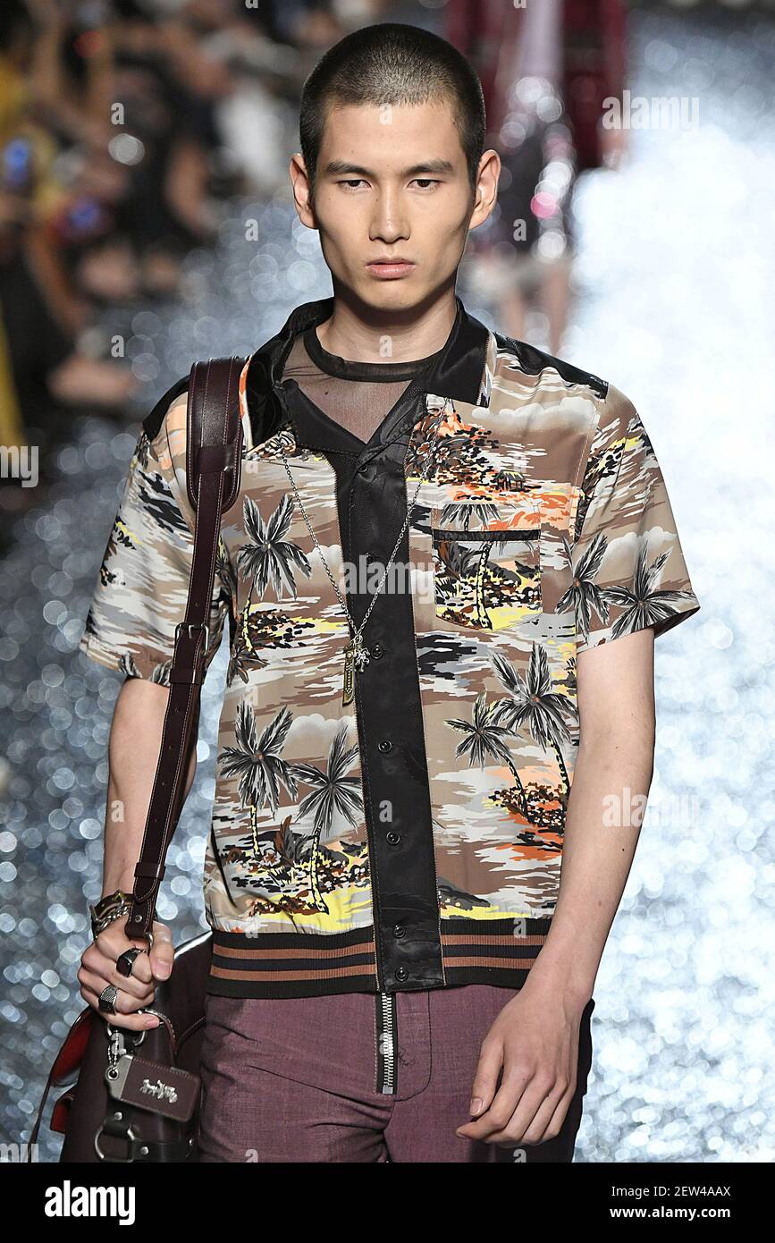 Model Kohei Takabatake walks on the runway during the Coach Fashion ...