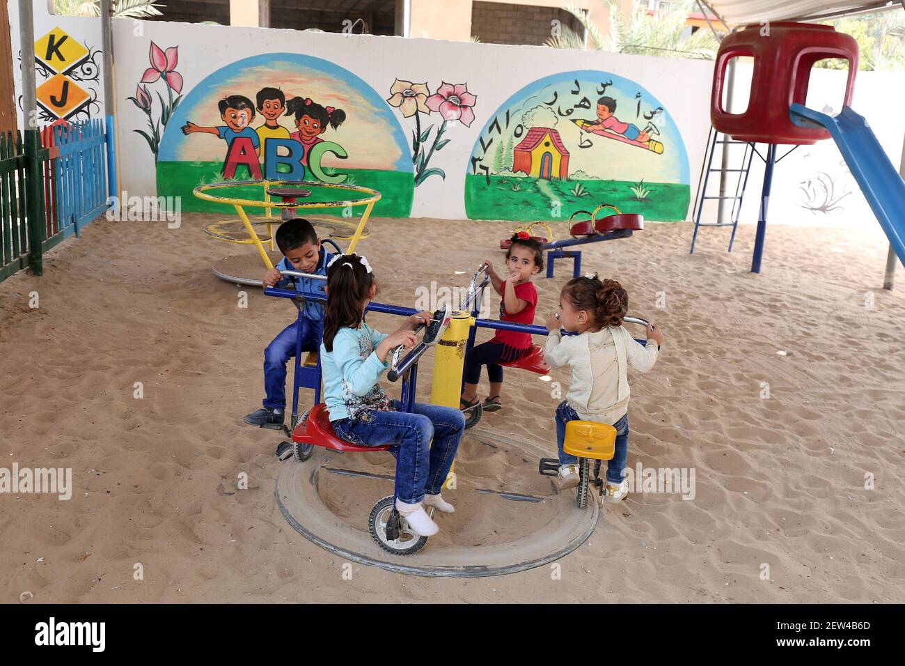 Palestinian children learn in the "Baraem Islamic" kindergarten in ...