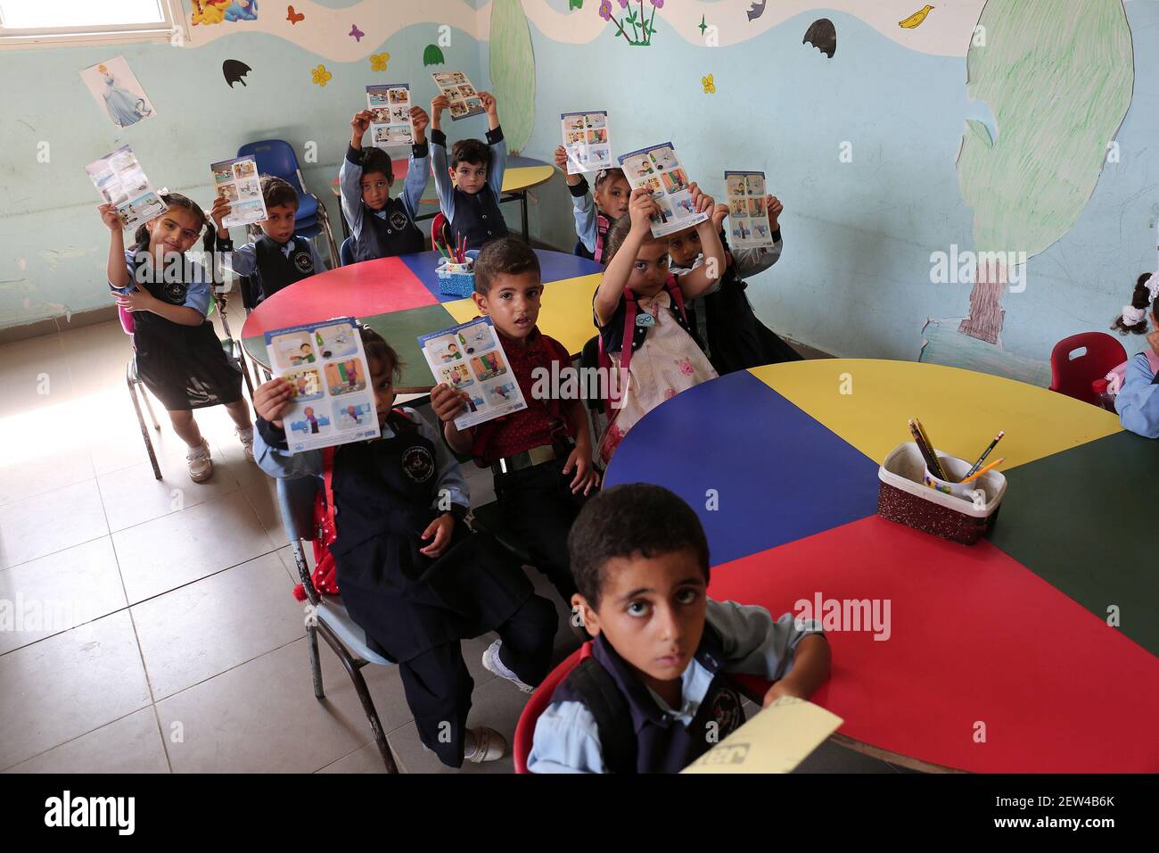 Palestinian children learn in the "Baraem Islamic" kindergarten in ...