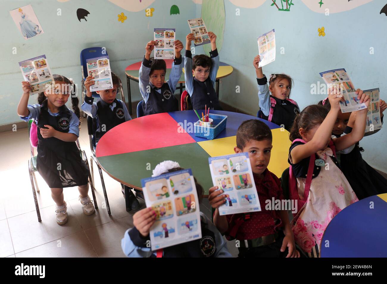Palestinian children learn in the "Baraem Islamic" kindergarten in ...