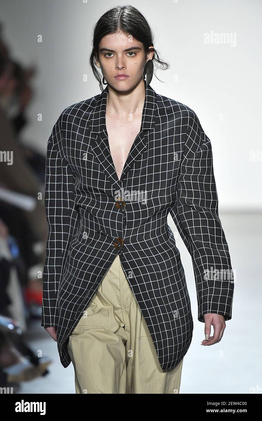 Model Kristen Coffey walks on the runway during the Colovos Fashion ...