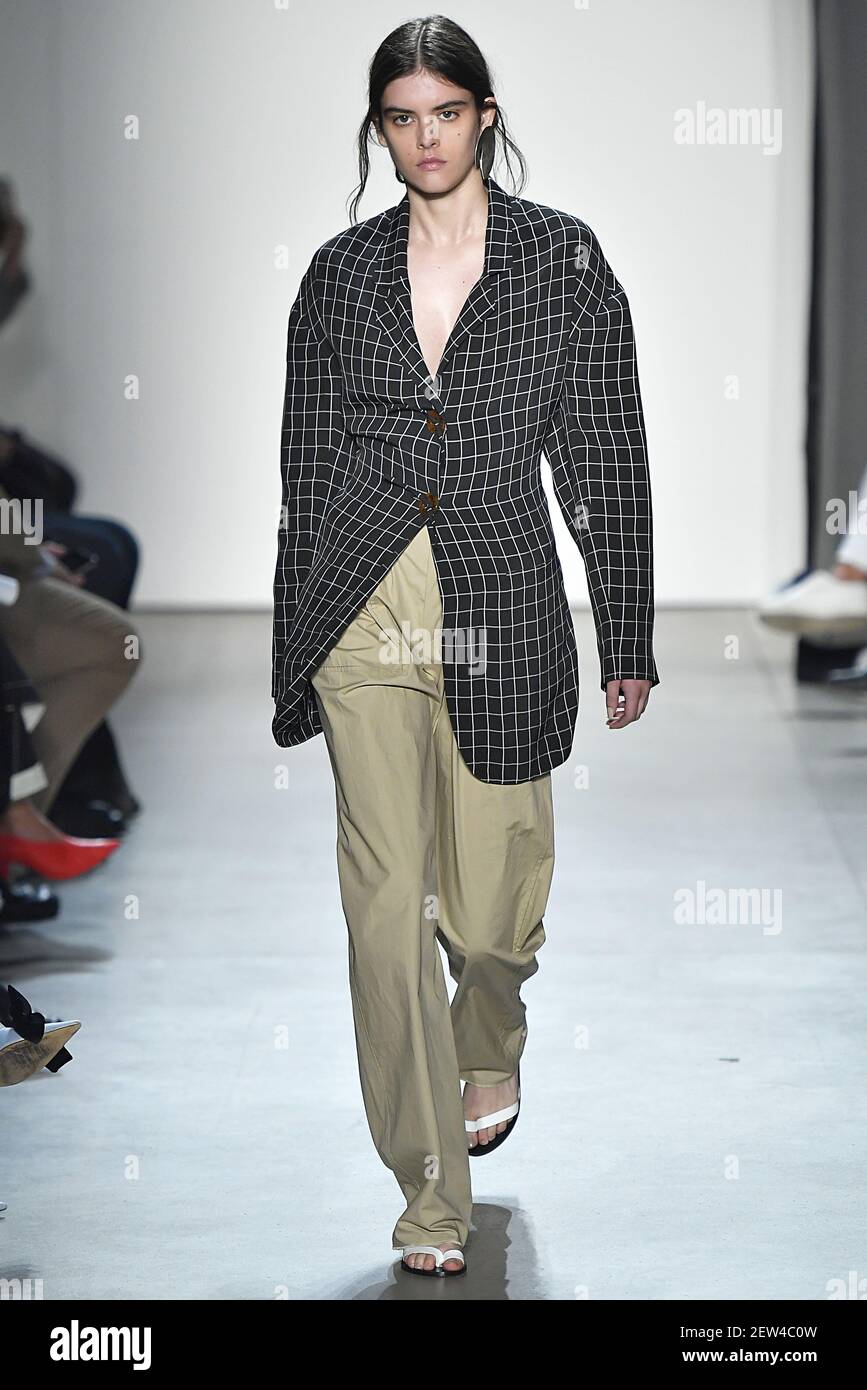 Model Kristen Coffey walks on the runway during the Colovos Fashion ...