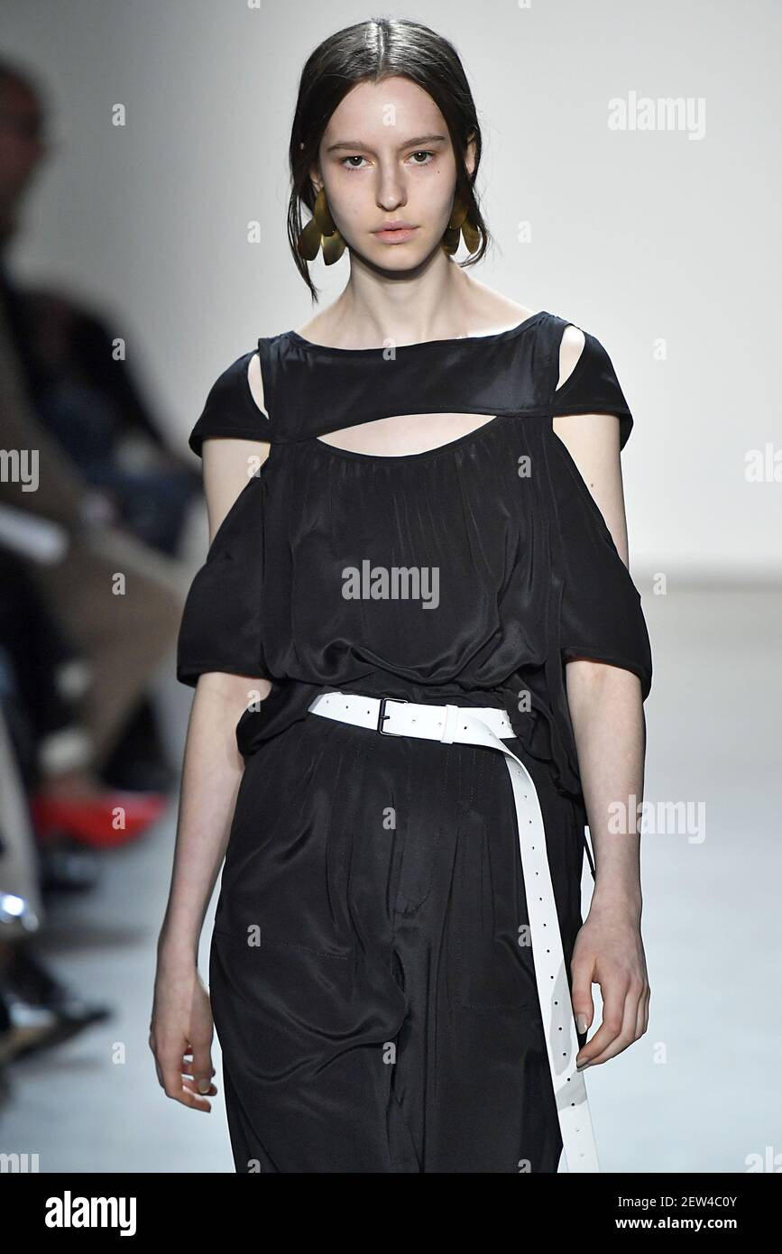 Model Lark Huska walks on the runway during the Colovos Fashion show at ...