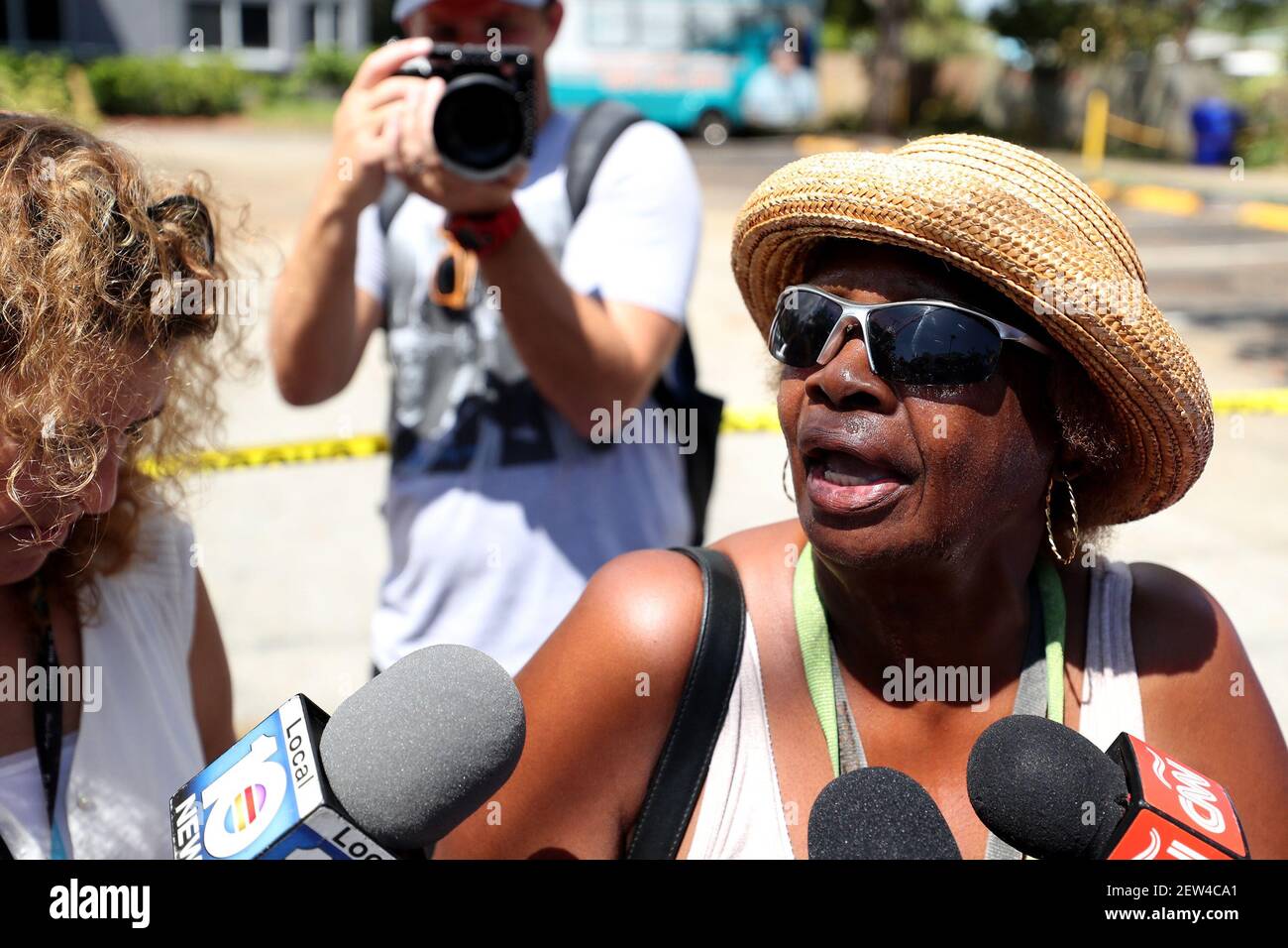 Flora Mitchell, of Dania Beach, answers questions from the media ...