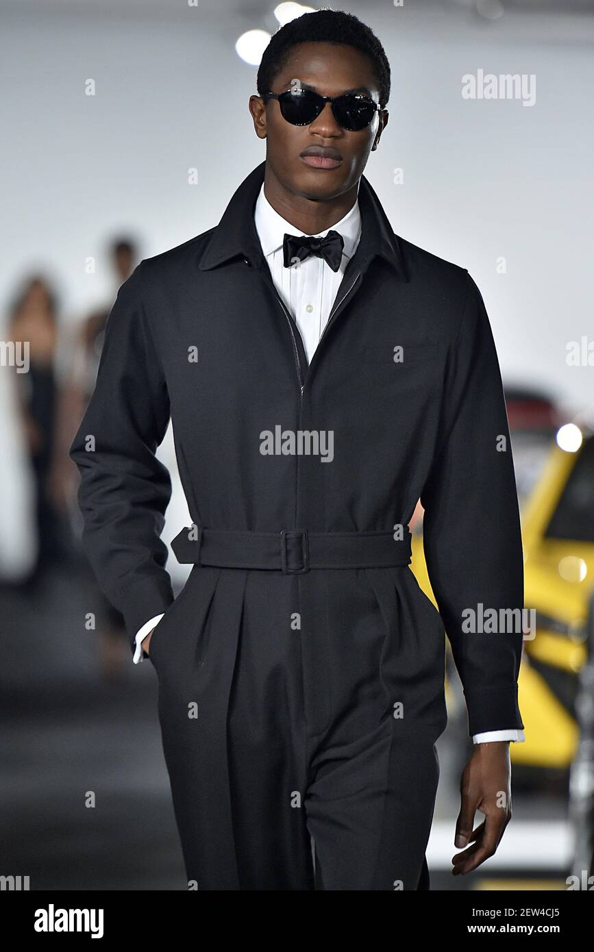Model Hamid Onifade walks on the runway during the Ralph Lauren Fashion ...