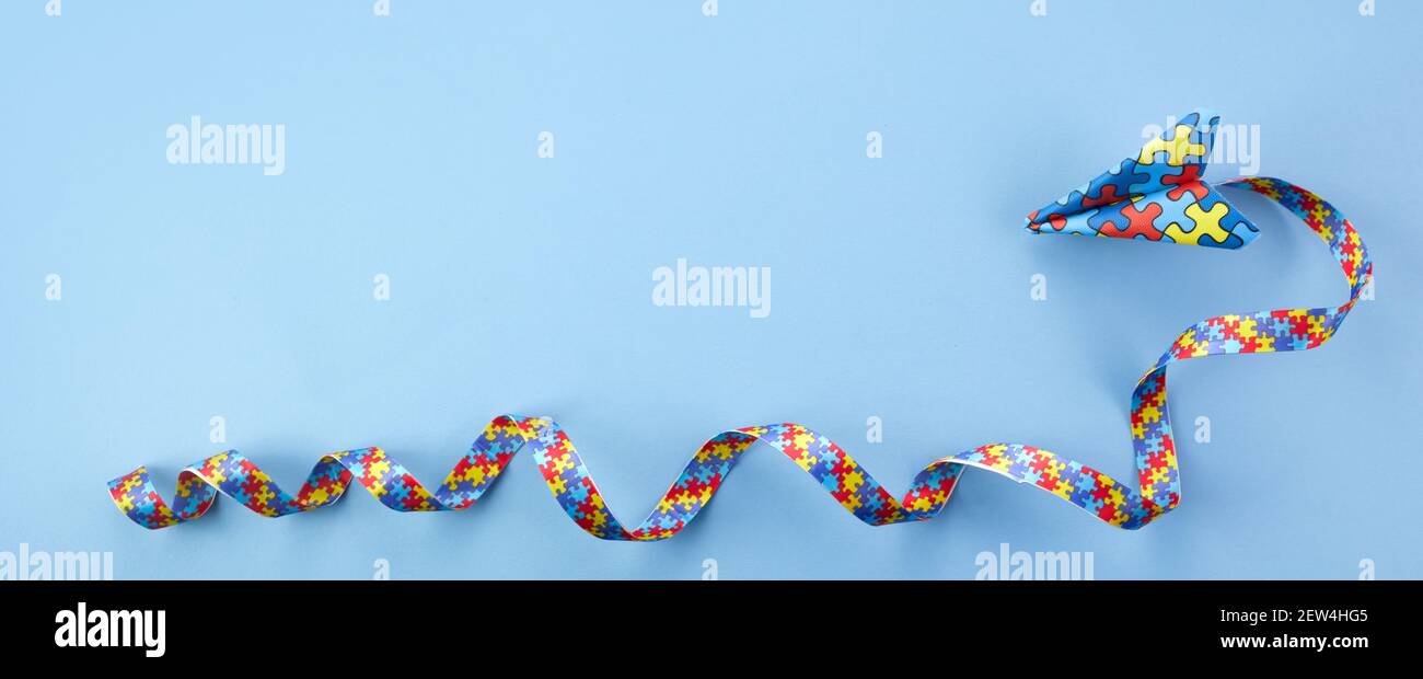 Autism awareness. paper plane in origami style with autism awareness ...