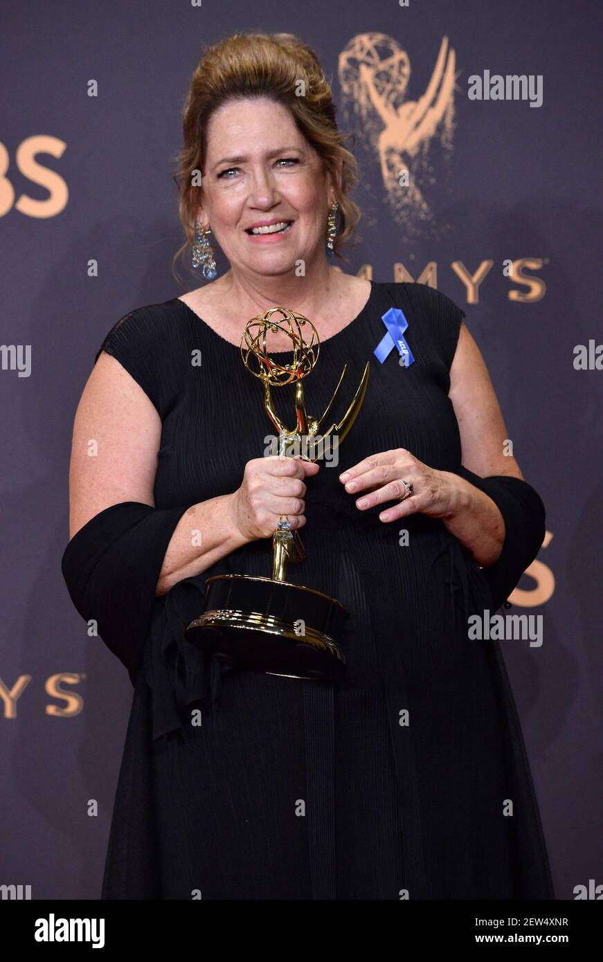 Actor Ann Dowd, winner of the Outstanding Supporting Actress in a Drama ...