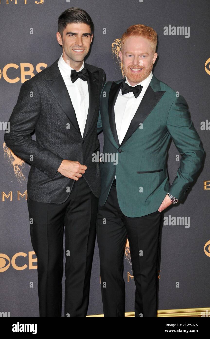 Jesse Tyler Ferguson (R) and Justin Mikita at the 69th Annual Emmy ...