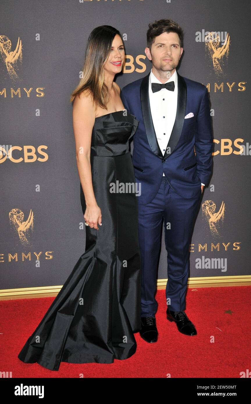 Naomi Scott (L) and actor Adam Scott at the 69th Annual Emmy Awards held at the Microsoft ...