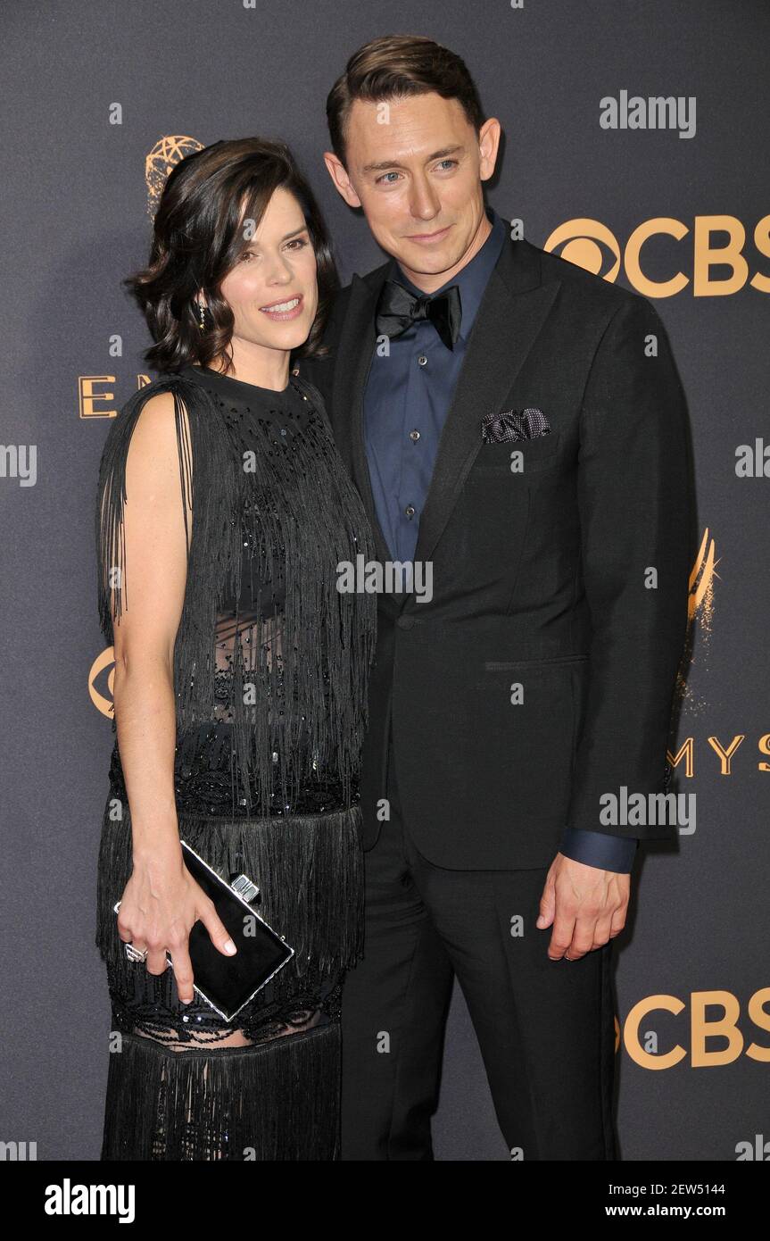 Neve Campbell and JJ Feild at the 69th Annual Emmy Awards held at the ...