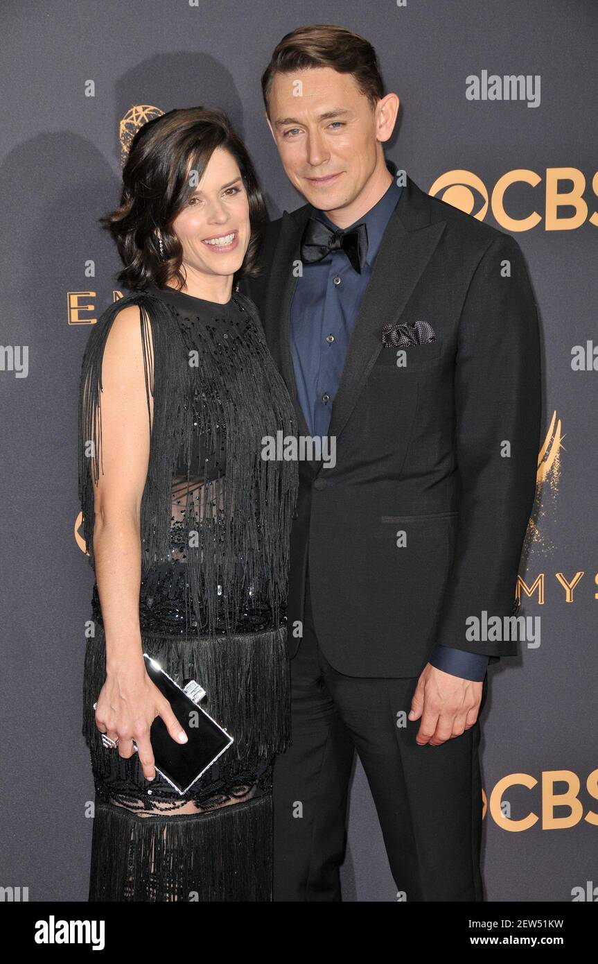 Neve Campbell and JJ Feild at the 69th Annual Emmy Awards held at the ...