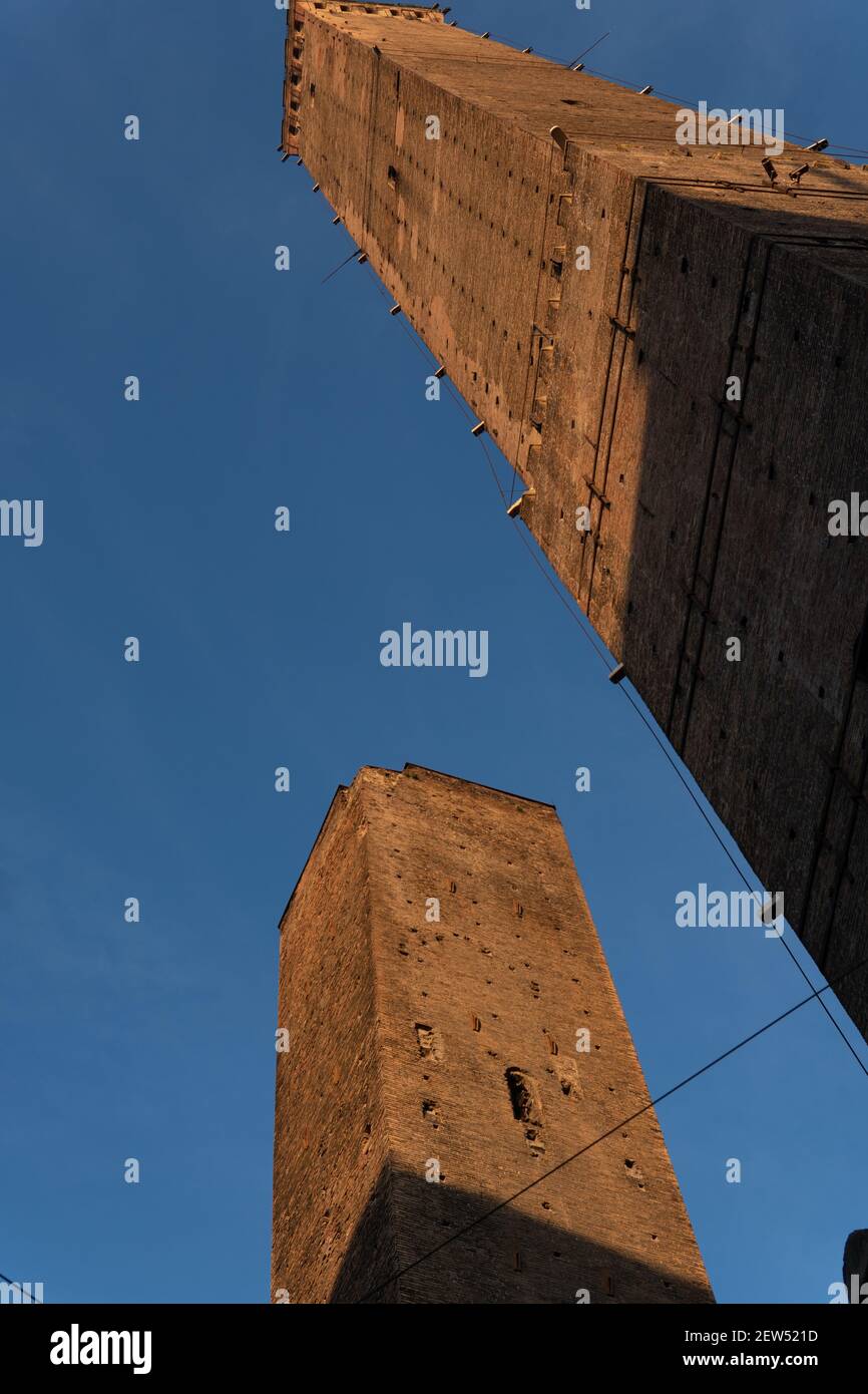 Low angle photo of the two high towers and the city wires on a clear ...