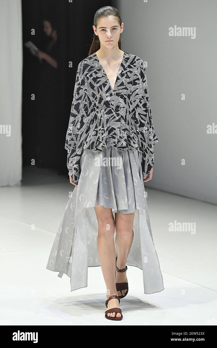 Model Inga Dezhina walks on the runway during the Chalayan Fashion Show ...