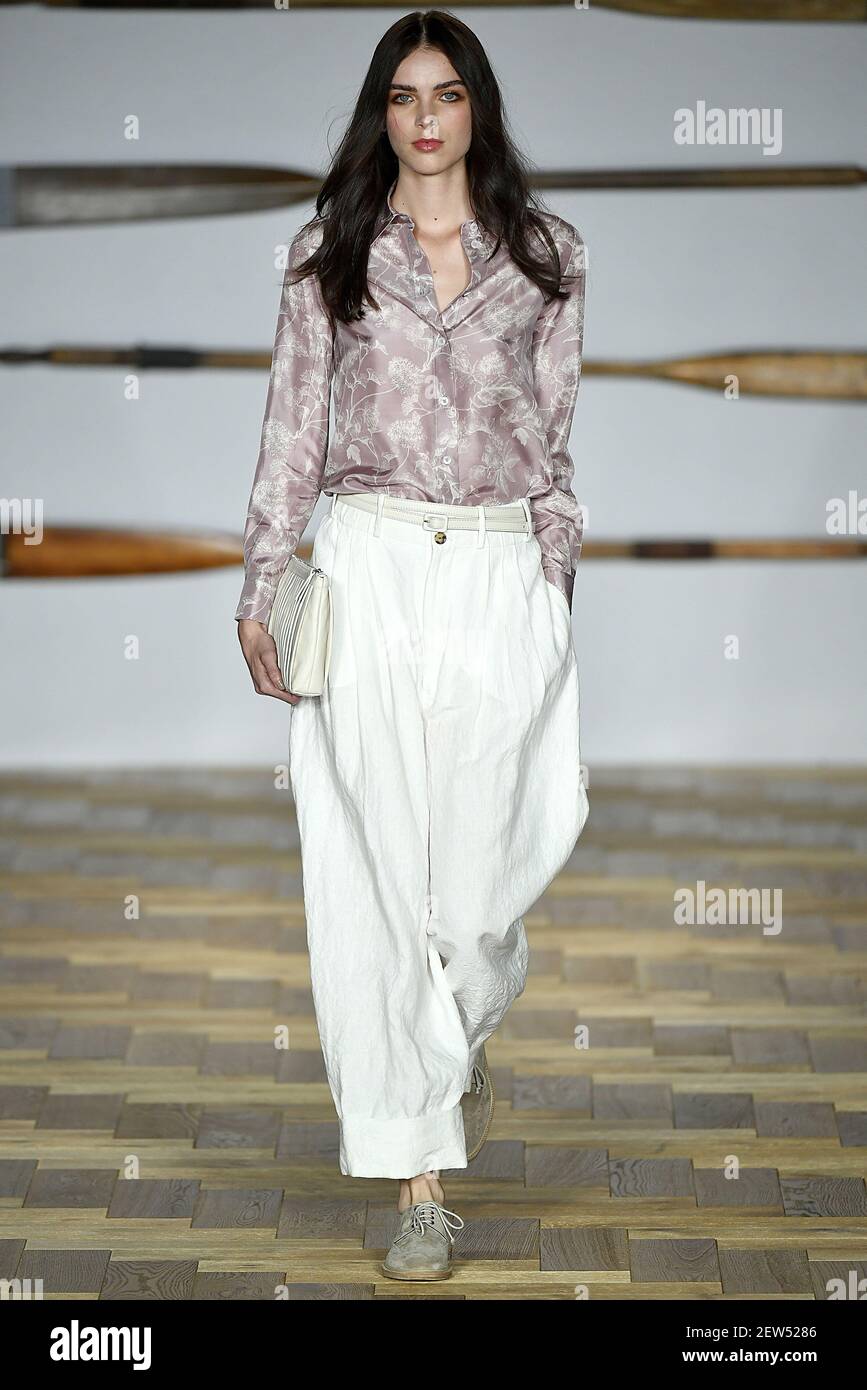 Model Sanne de Roo walks on the runway during the Daks Fashion Show ...