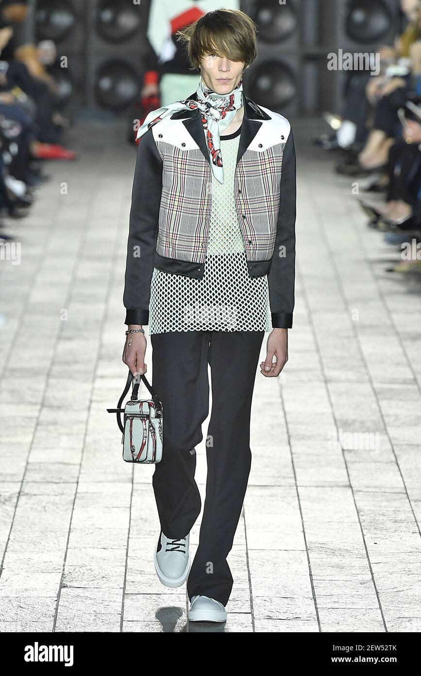 Model Finnlay Davis walks on the runway during the Versus Versace ...