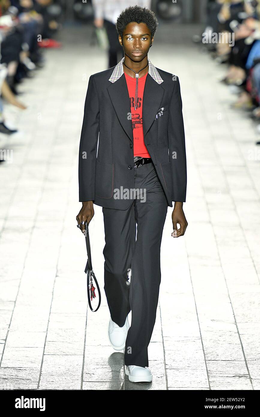 Model Alton Mason walks on the runway during the Versus Versace Fashion ...