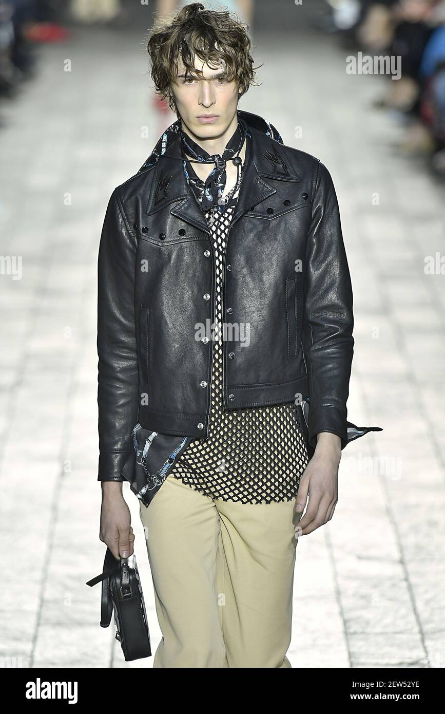 Model Dylan Fender walks on the runway during the Versus Versace ...