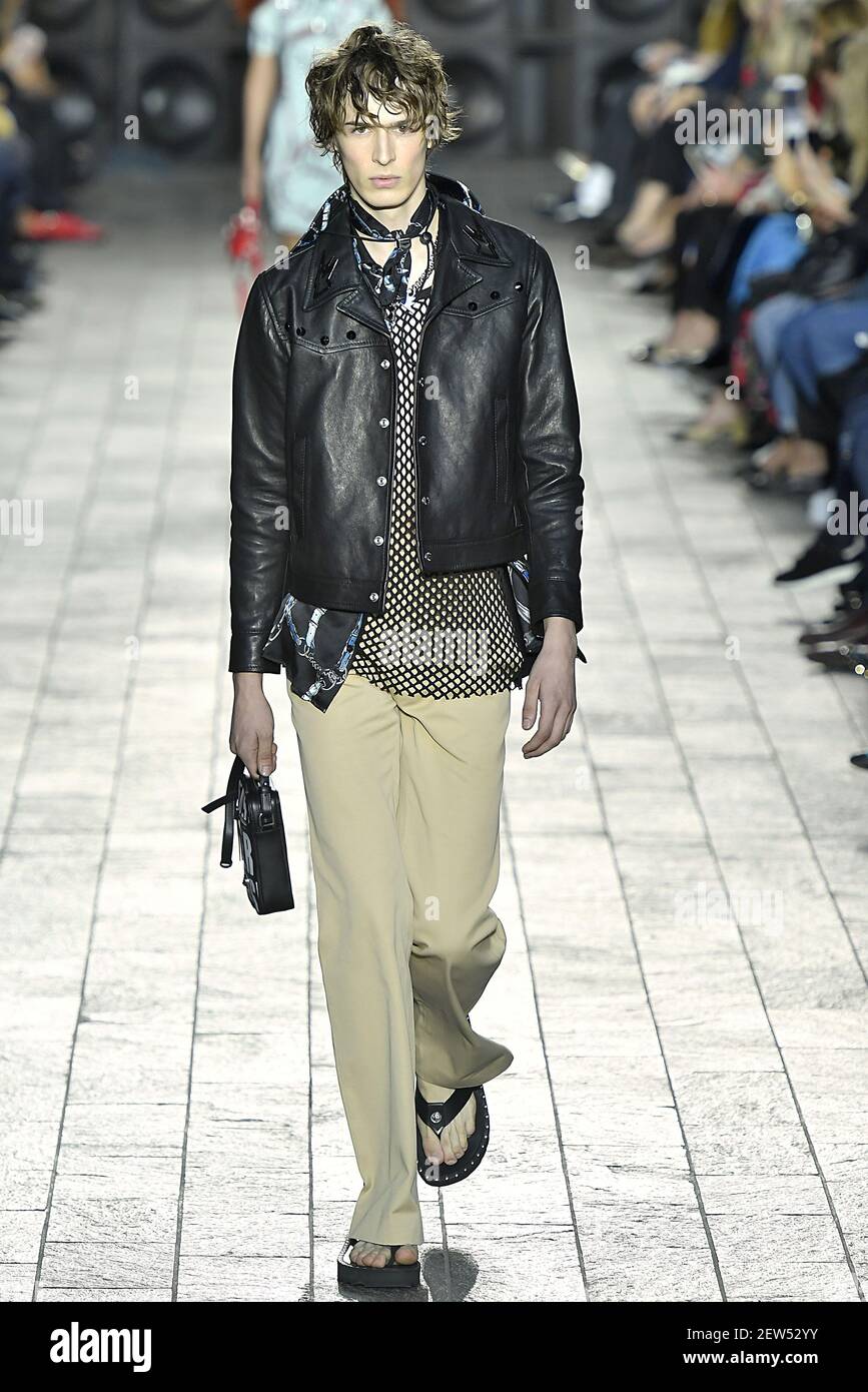 Model Dylan Fender walks on the runway during the Versus Versace ...