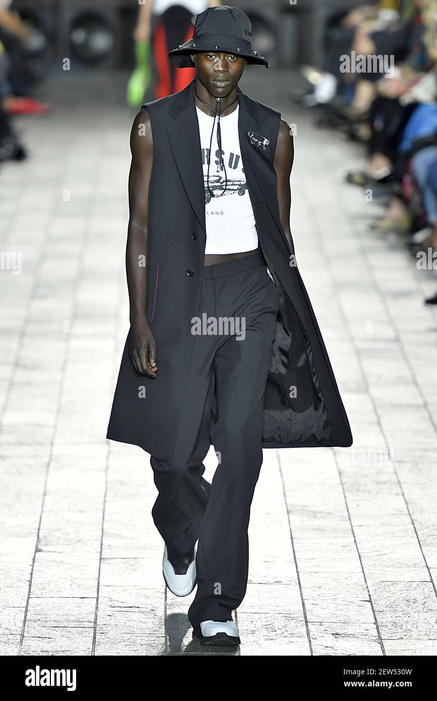 Model Alpha Dia walks on the runway during the Versus Versace Fashion ...