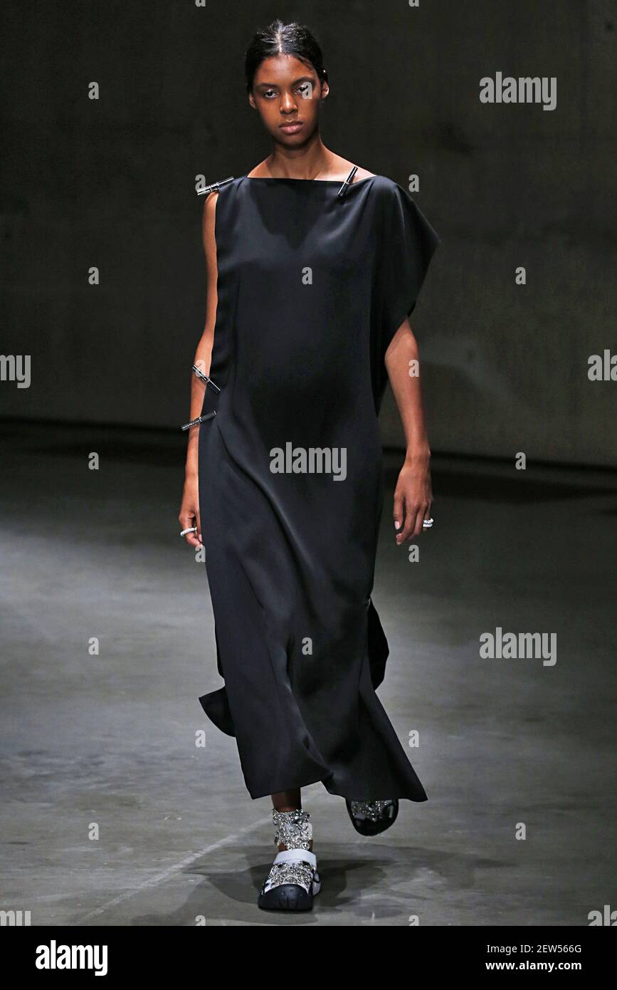 Model Alyssa Traore walks on the runway during the Christopher Kane ...