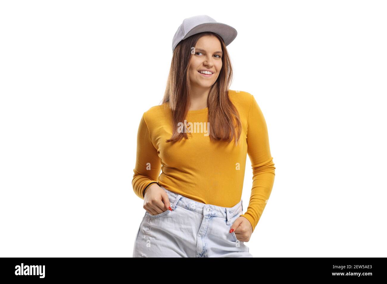 Cool young female with a cap posing isolated on white background Stock ...