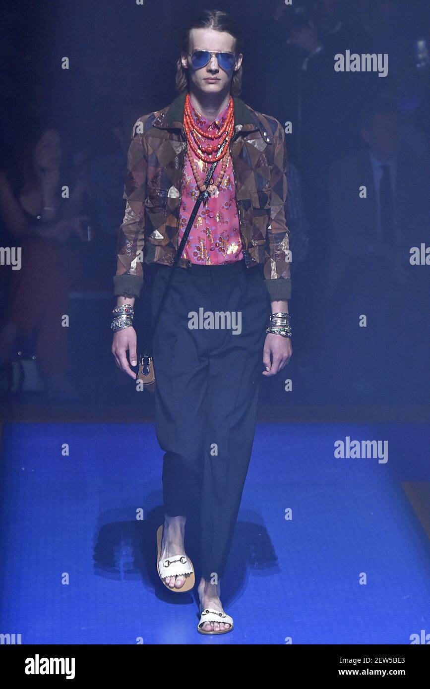 Model Martin Lind walks on the runway during the Gucci Fashion Show ...