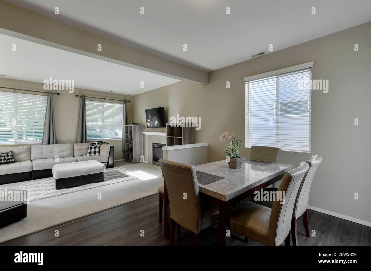 Modern residential dining room and living room interior Stock Photo - Alamy