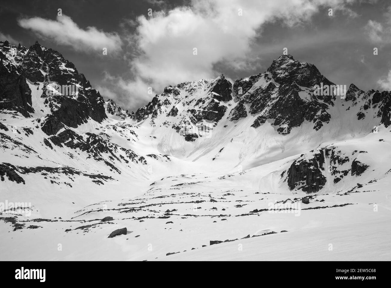 Snowy mountains with traces from avalanche in sunny spring day. Turkey ...
