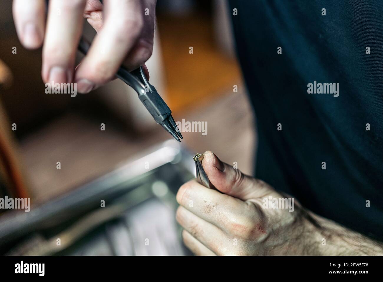Stock Photo of a man hands working with tools in artisan workshop Stock ...