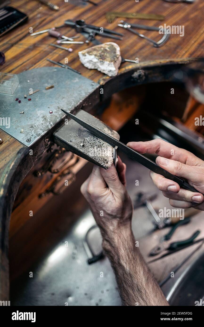 Stock Photo of a man hands working with tools in artisan workshop Stock ...