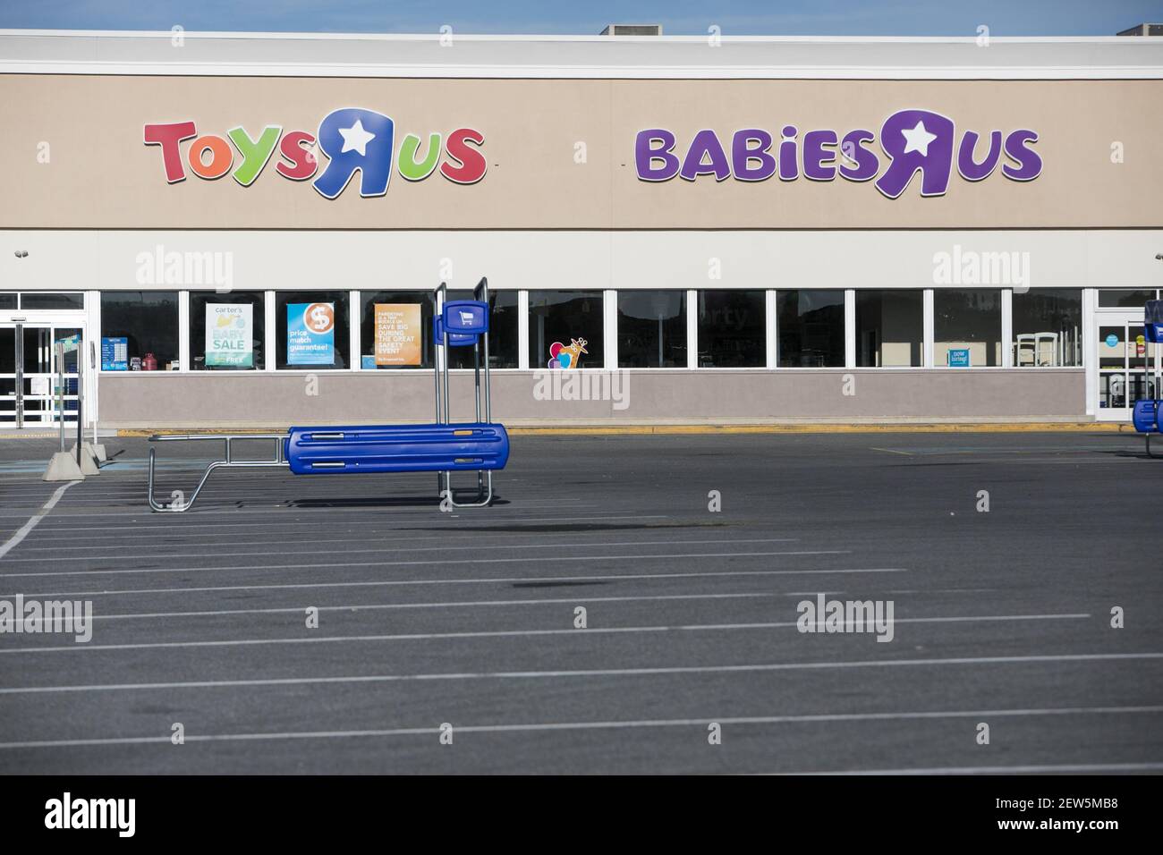 A logo sign outside of a Toys "R" Us and Babies "R" Us retail store in ...