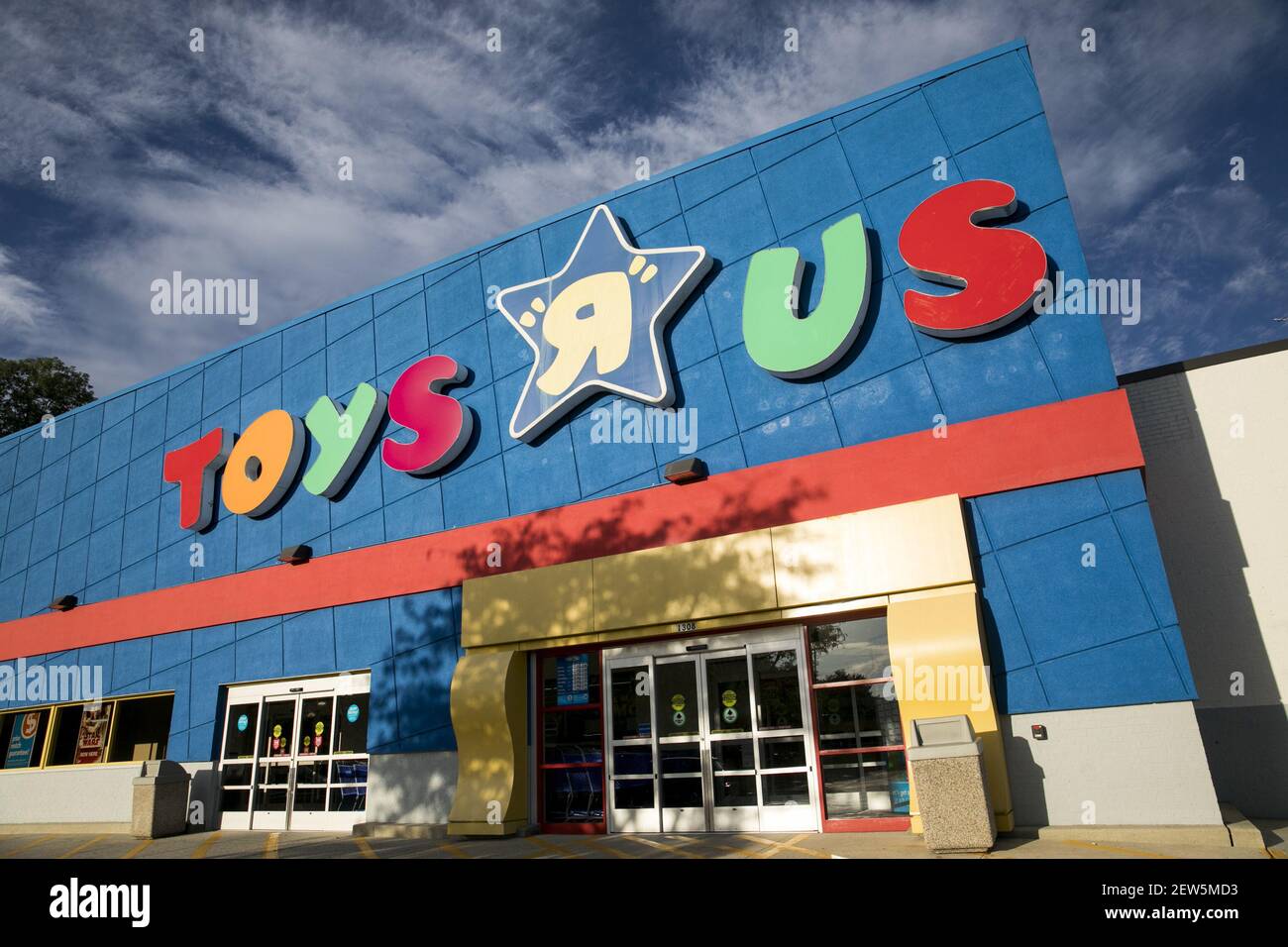 A logo sign outside of a Toys "R" Us retail store in Frederick ...