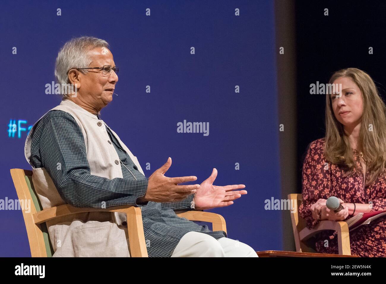 Chelsea Clinton (R) is seen with Muhammad Yunus (L) during a panel ...