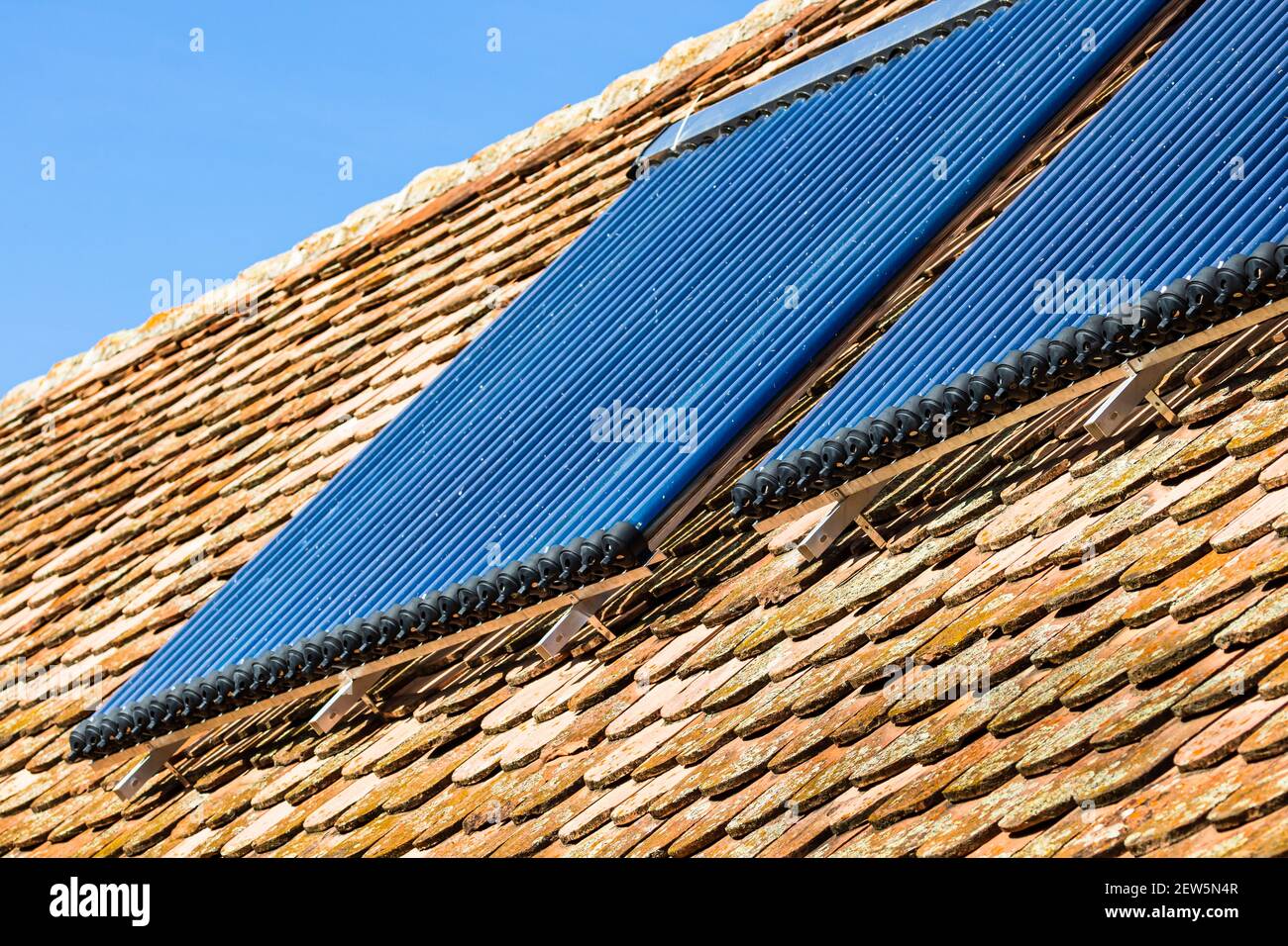 Close up of solar water heater on roof top. Solar panel for hot water ...